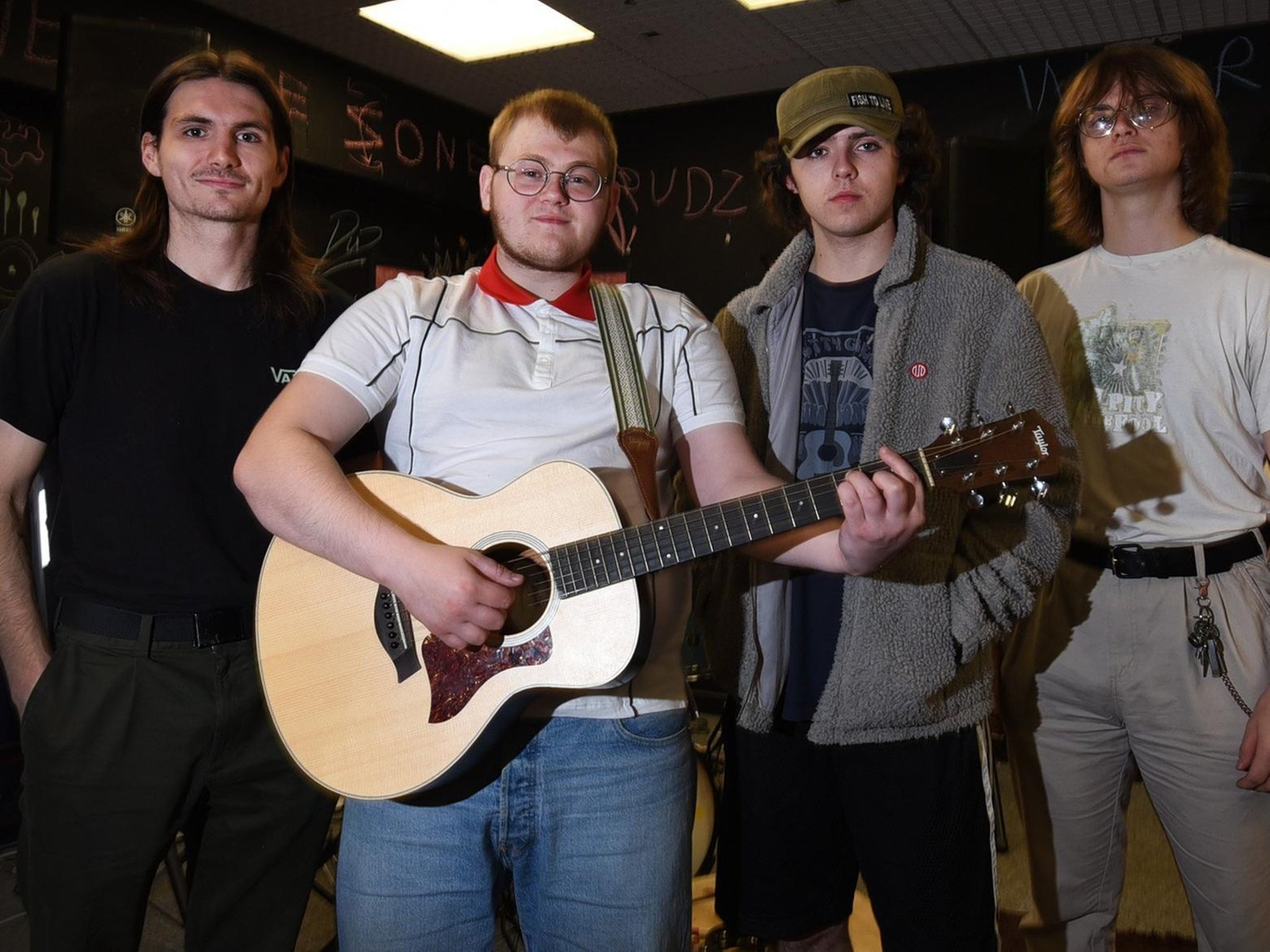 The Lathums, a Wigan-based indie band, have achieved their first number ...